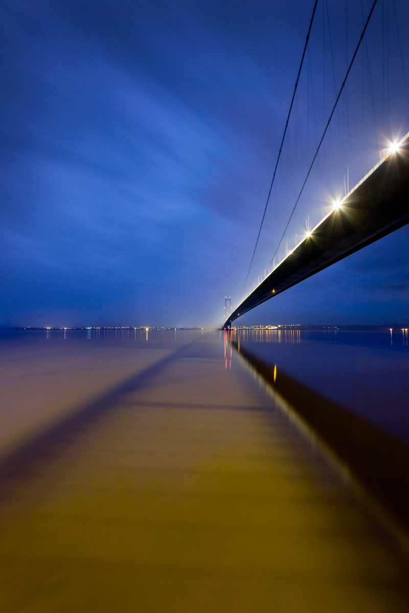 Landscape photograph of the converging lines of the Humber Bridge